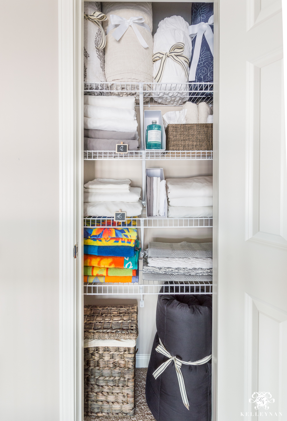 A Small Organized Linen Closet And Ideas To Store Bulky Bedding