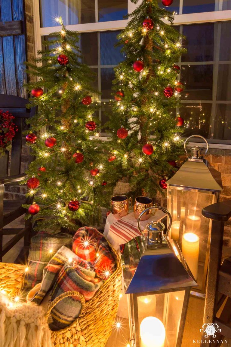 A Twist on Classic Front Porch Christms Decor with Multiple Trees